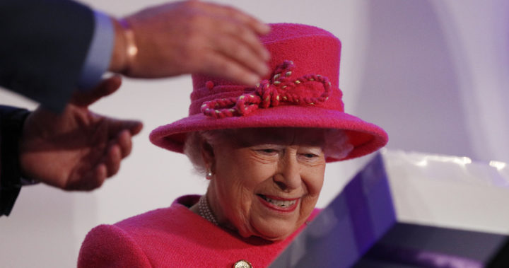 The Queen is pretty in pink for solo royal engagement - Starts at 60
