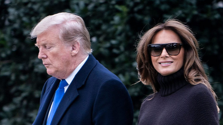 Beautiful Melania rugs up in black knitted cape for weekend away ...