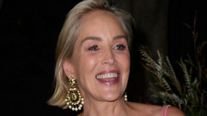 She’s still got it! Sharon Stone sizzles in figure-hugging flared white ...