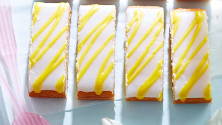 Classic zesty lemon drizzle slice - Starts at 60