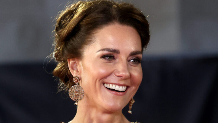 Catherine a vision in plunging gold gown - Starts at 60