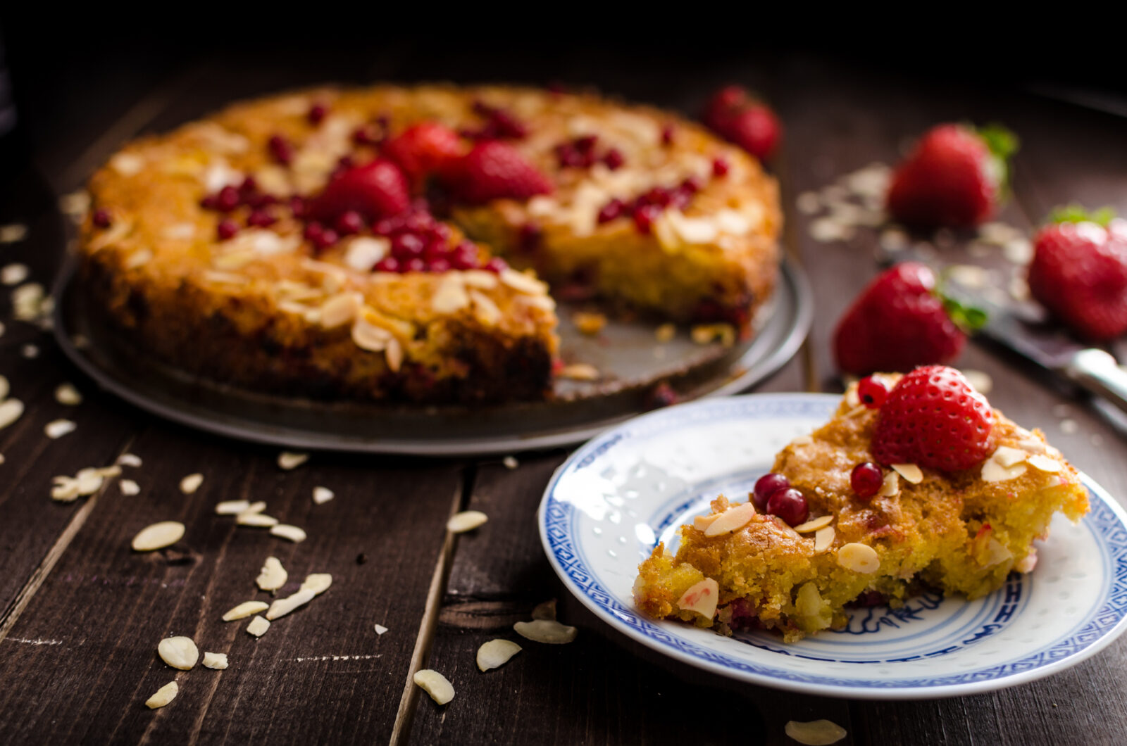 Homemade lemon raspberry polenta cake with strawberries - Starts at 60
